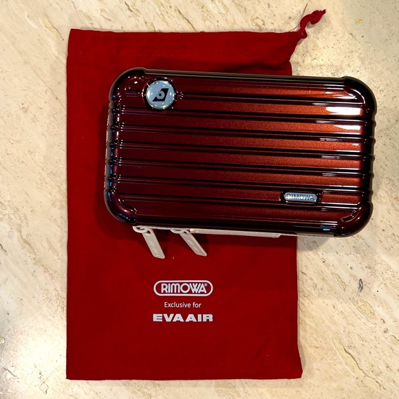 RIMOWA | Bags | Rimowa Toiletry Case From Eva Air In Metallic Burgundy ...